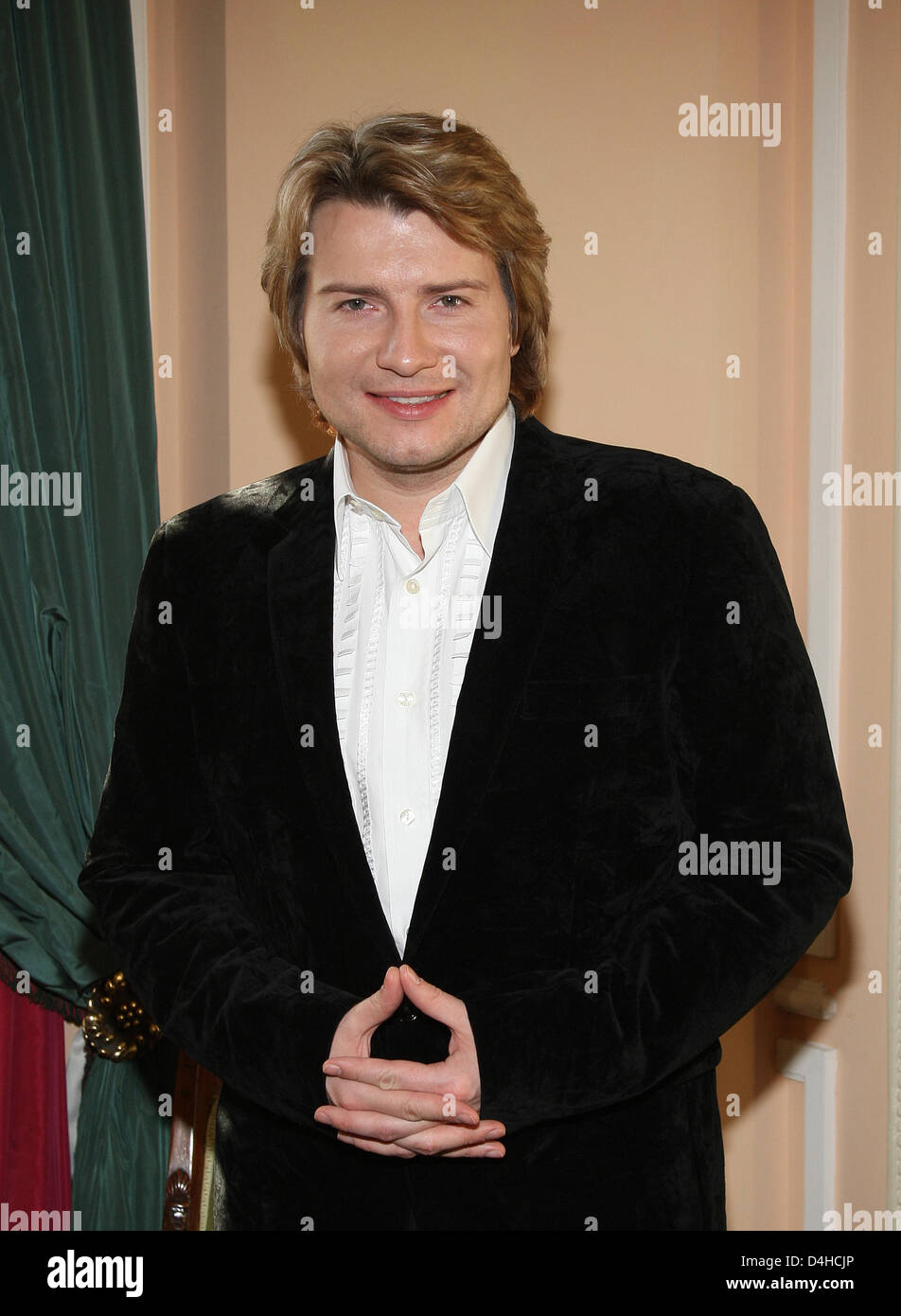 Russian star tenor Nikolay Baskov poses during a press conference on ...