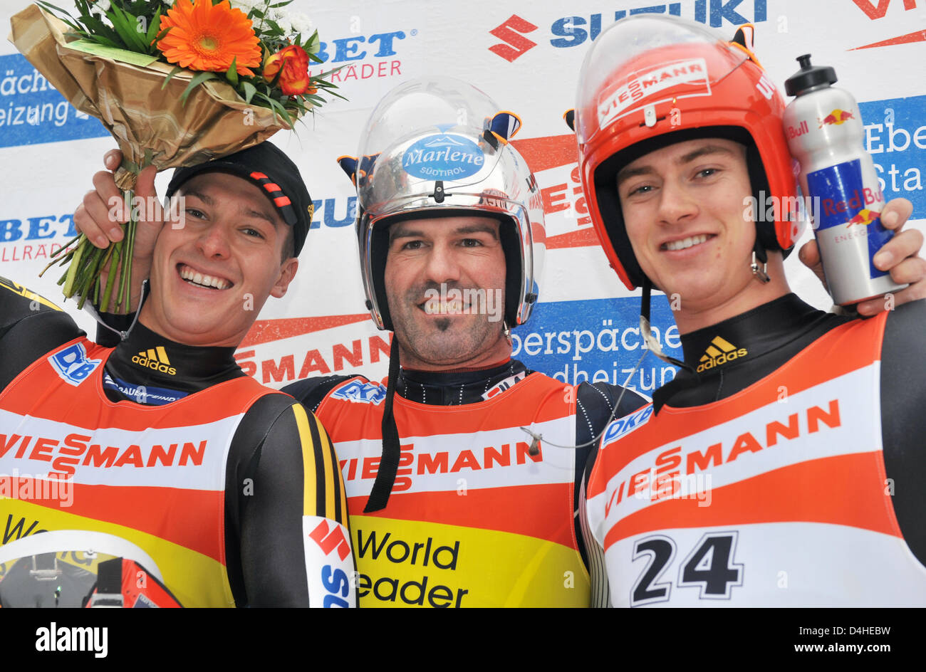Lugers David Moeller (L-R), Armin Zoeggeler and Johannes Ludwig pose on ...