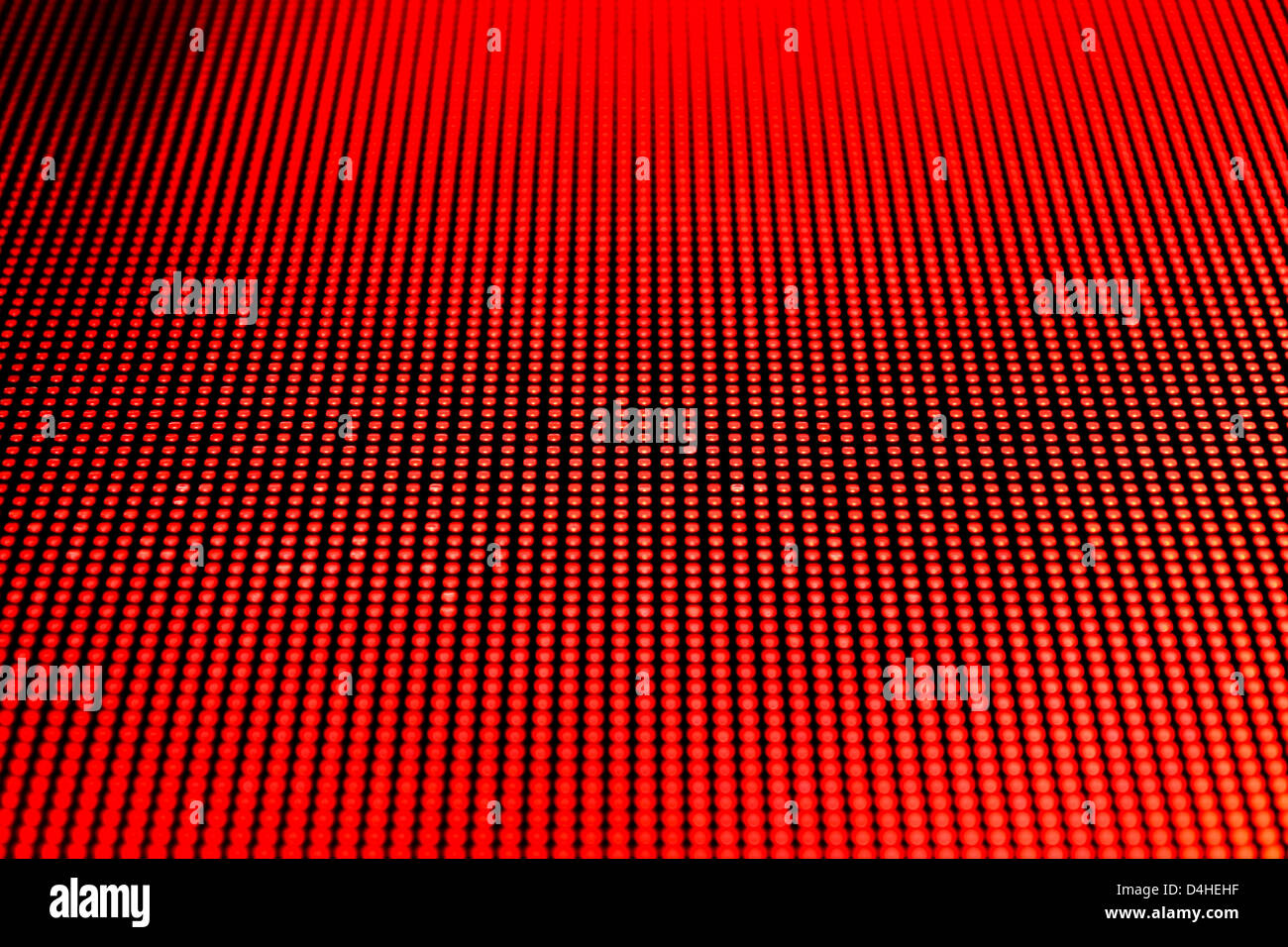 Red dot lights arranged on a video screen matrix. Shallow depth of ...