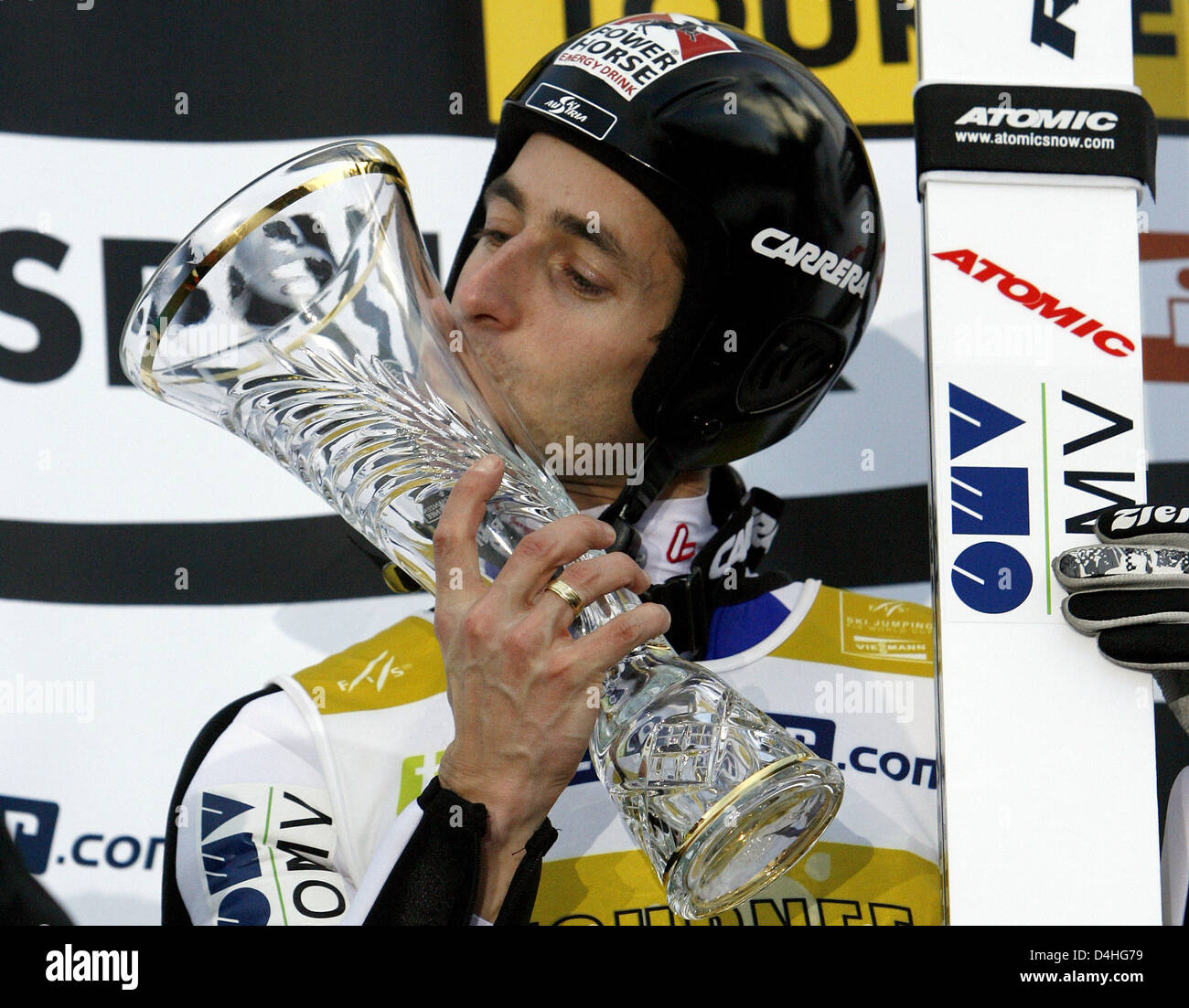 Austria?s winner Wolfgang Loitz kisses the trophy for winning the third ...