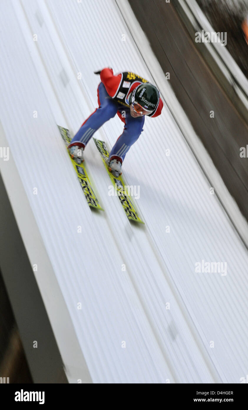 Russian ski jumper Dimitry Vassiliev seen in action during practice at ...
