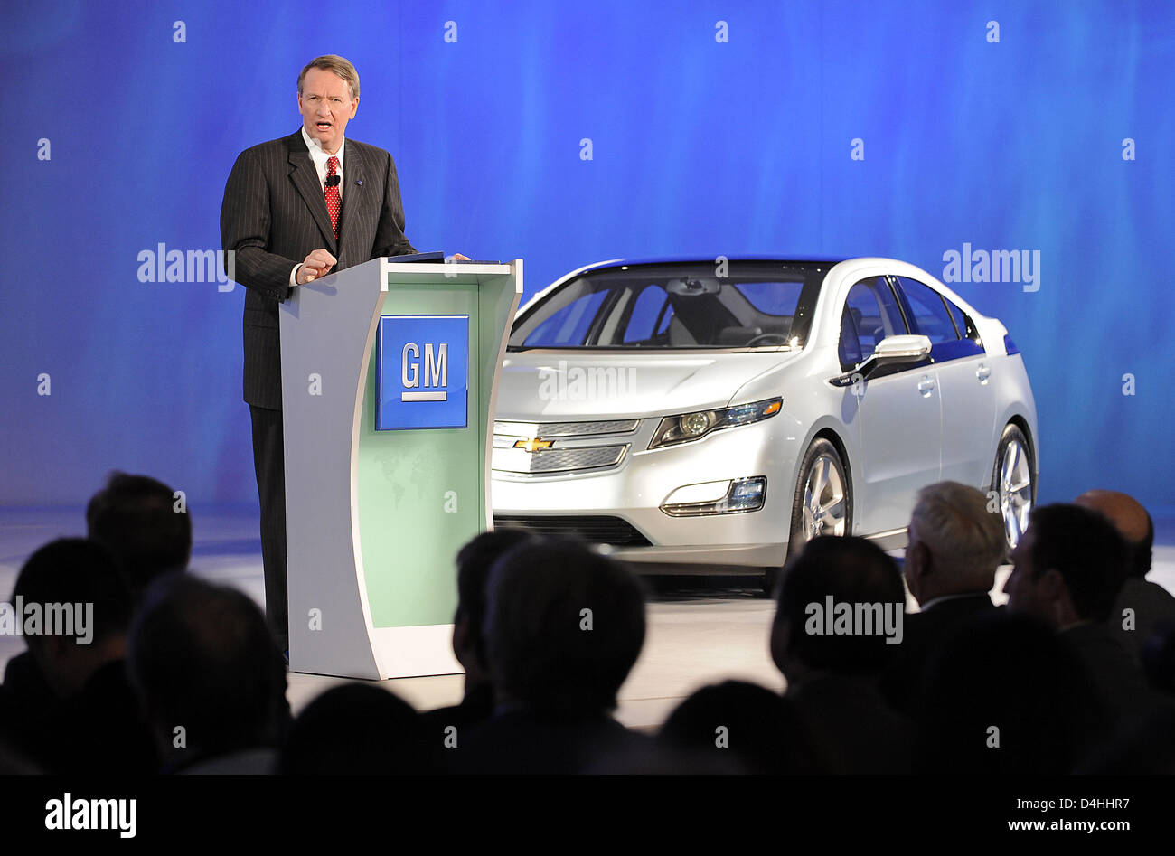 CEO of General Motors, Rick Wagoner, speaks in front of a Chevrolet ...