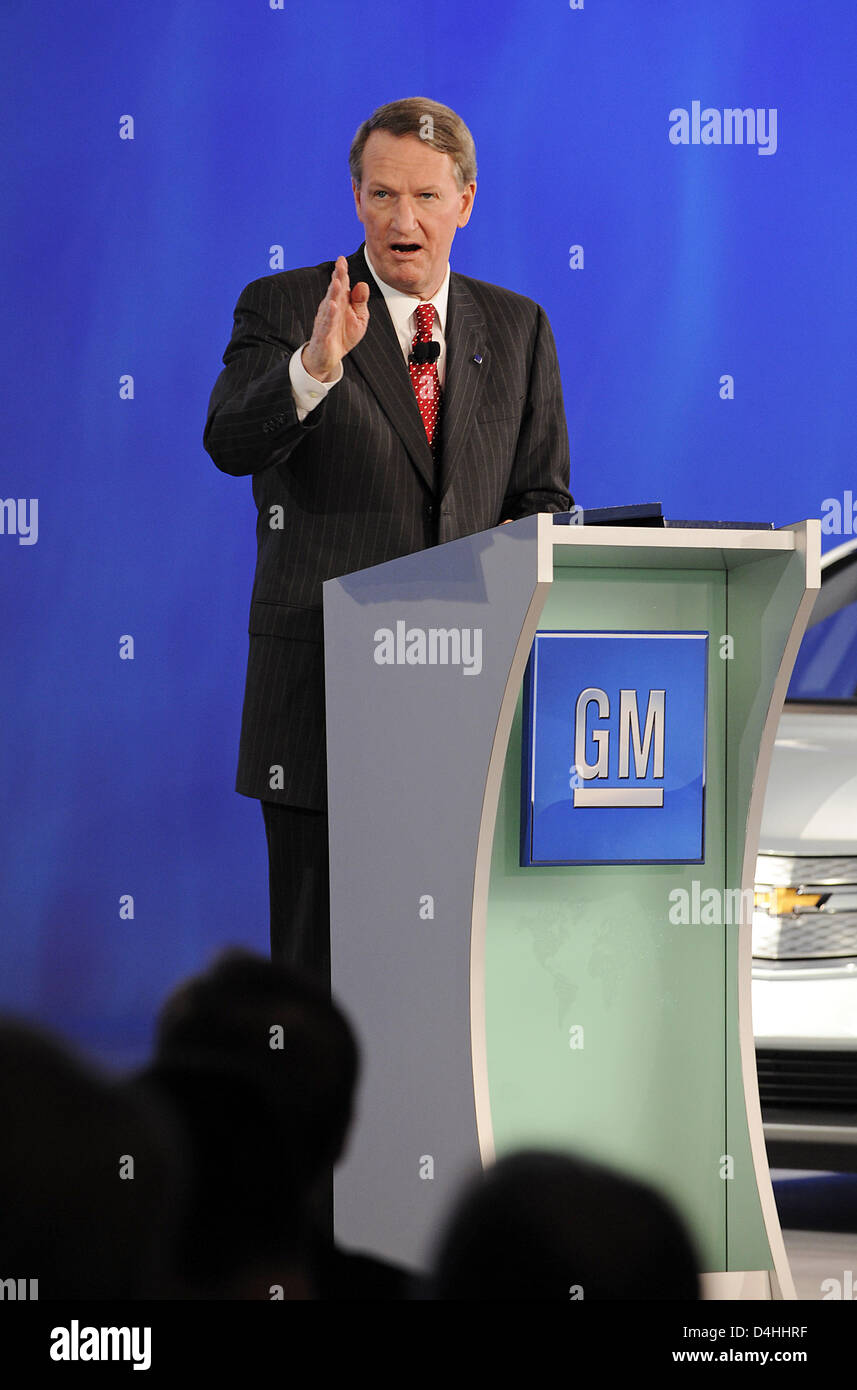 CEO of General Motors, Rick Wagoner, speaks in front of a Chevrolet ...