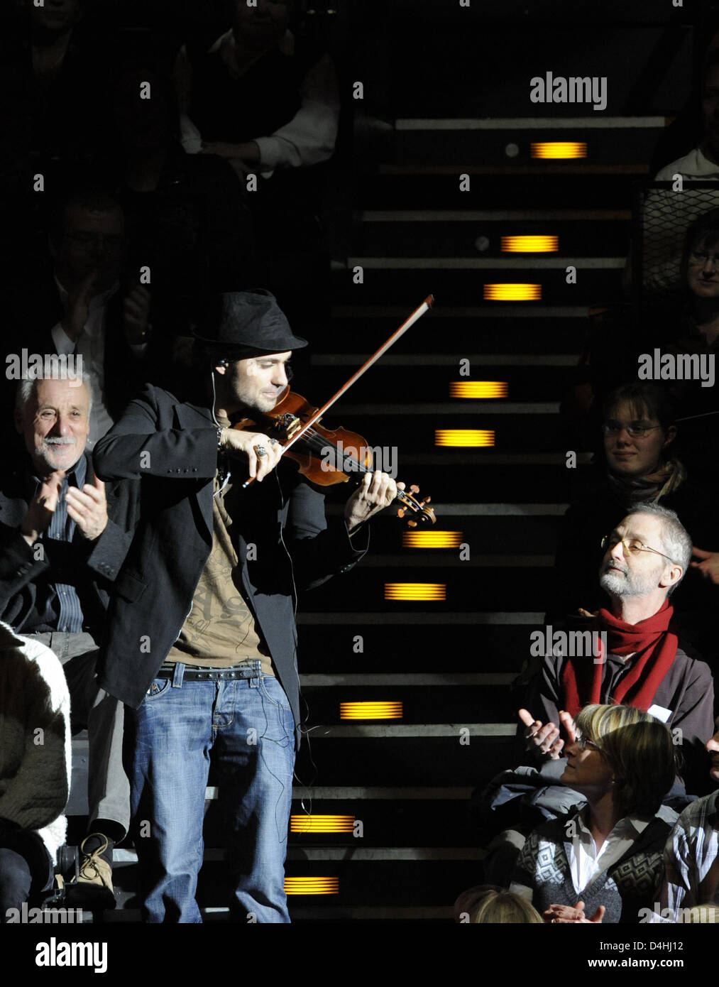 German-American violinist David Garrett (C) stages his new programme ...