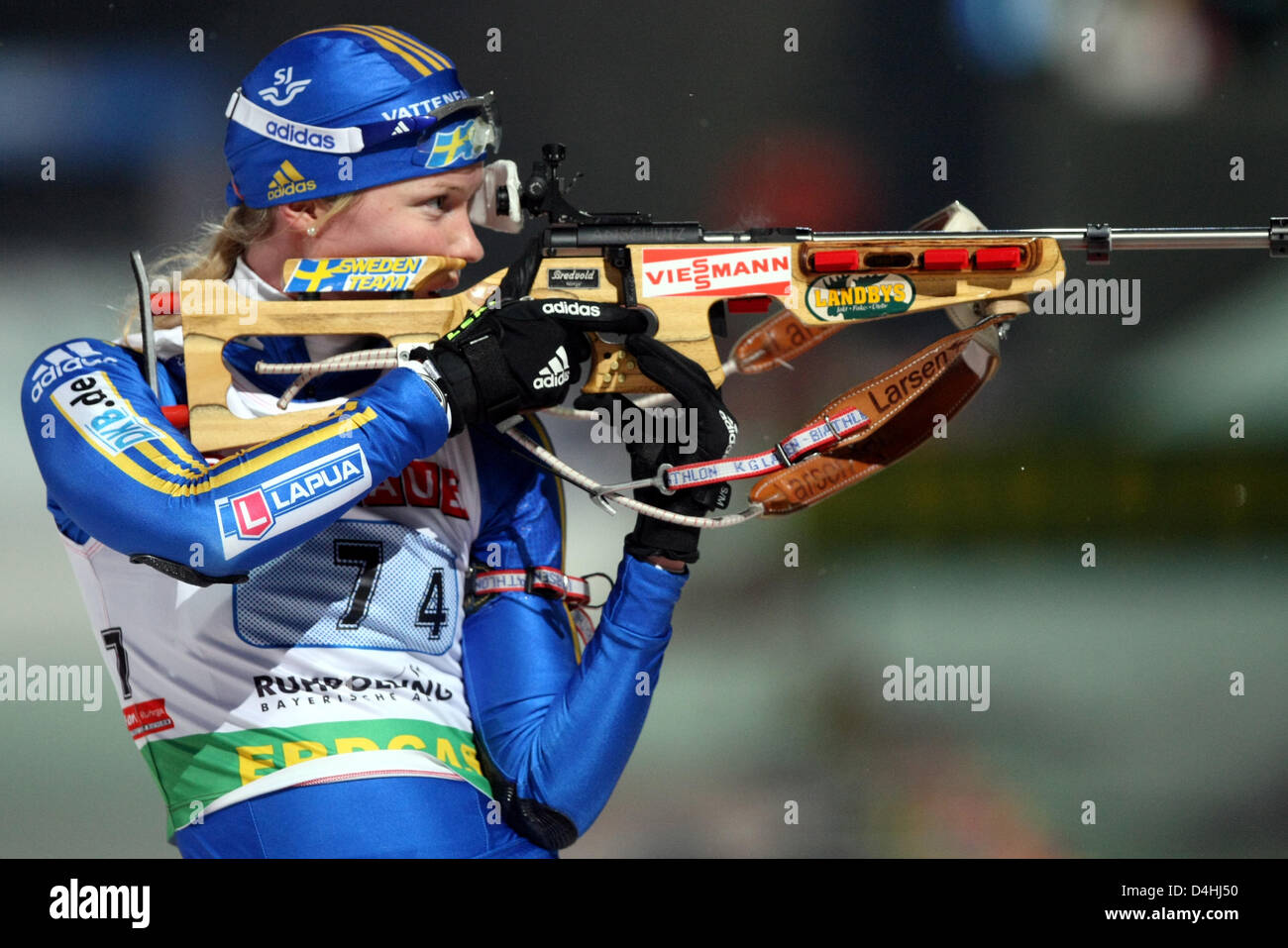 Swedish biathlete Anna Maria Nilsson shoots during the women?s 4x6 ...