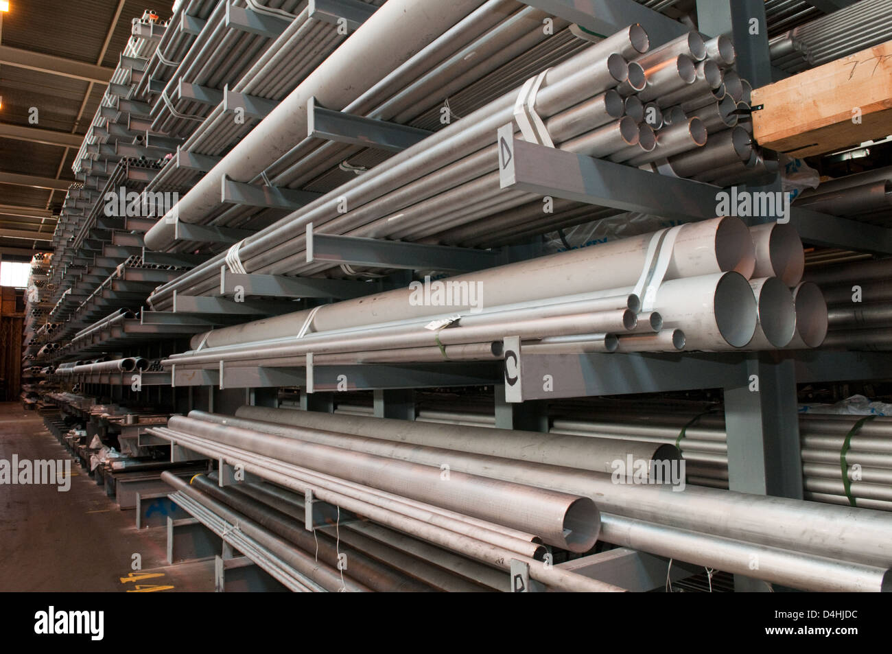 Steel tubes stacked in a warehouse at a steel stock holders in the West ...