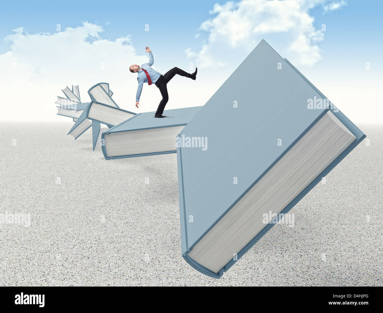 balanced man on 3d abstract books Stock Photo - Alamy