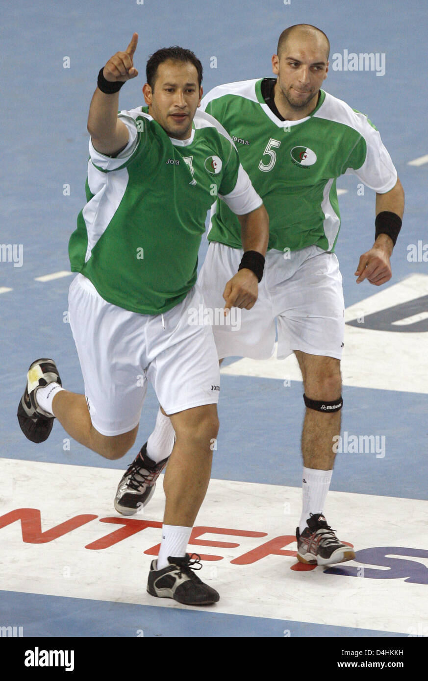 Algeria?s Hicem Boudrali (L) and Aziz Benkahla jubilate after scoring ...