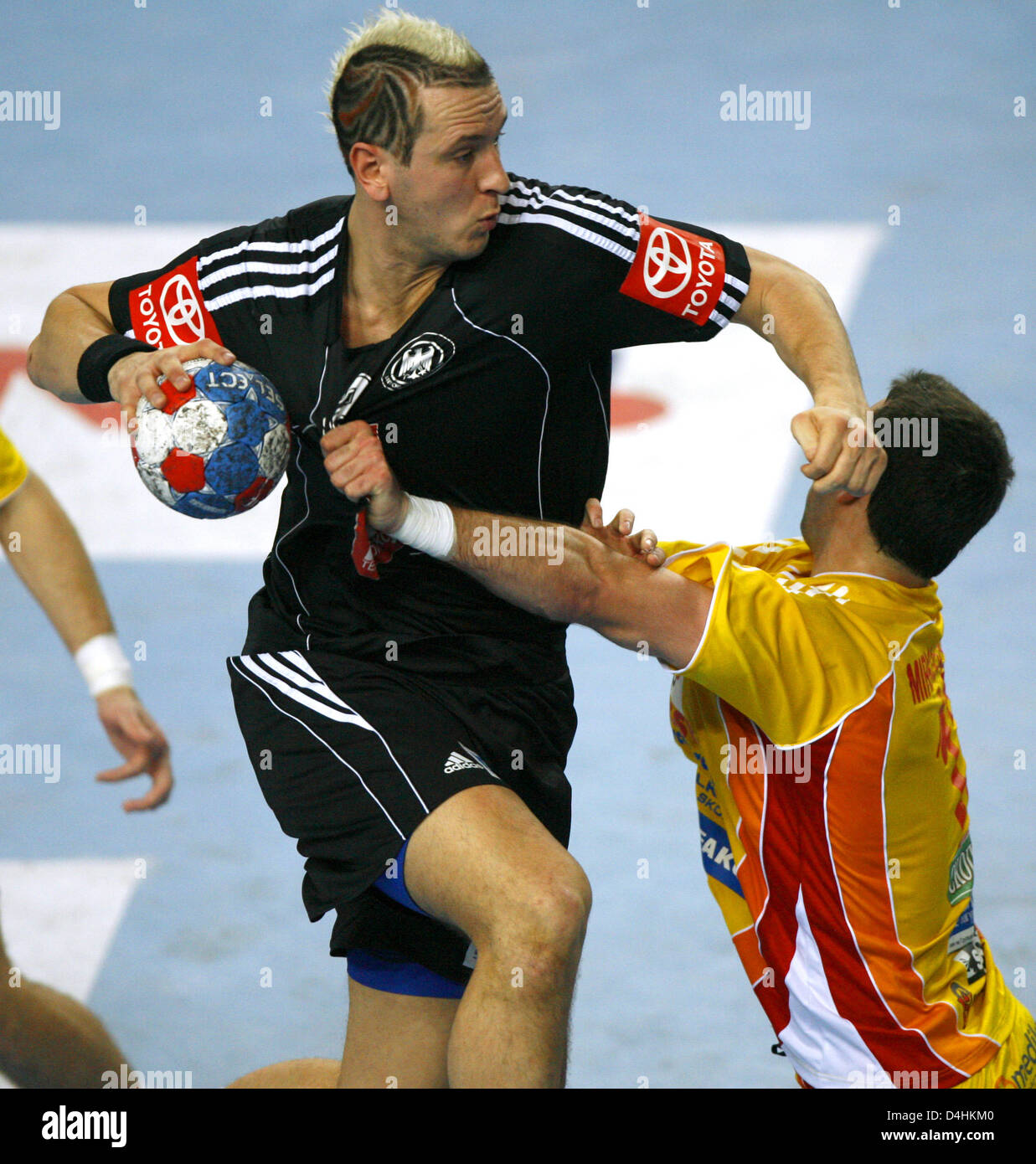 German player Pascal Hens (L) and Filip Mirkulovski of Macedonia seen ...