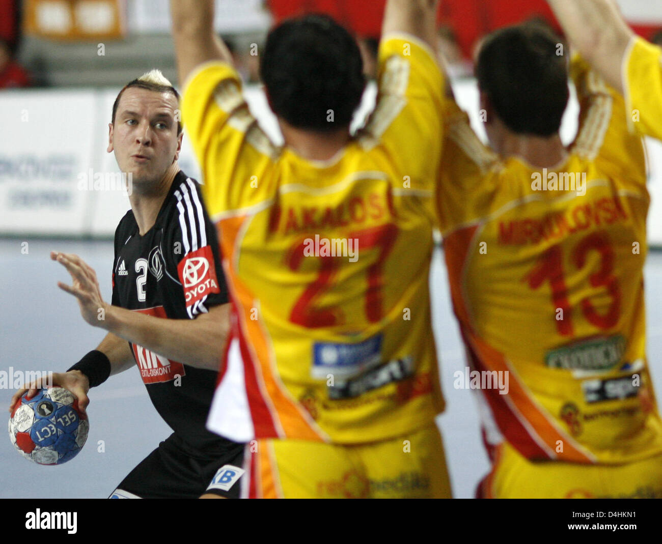 German player Pascal Hens (L) and Goce Makalovski (C) and Filip ...
