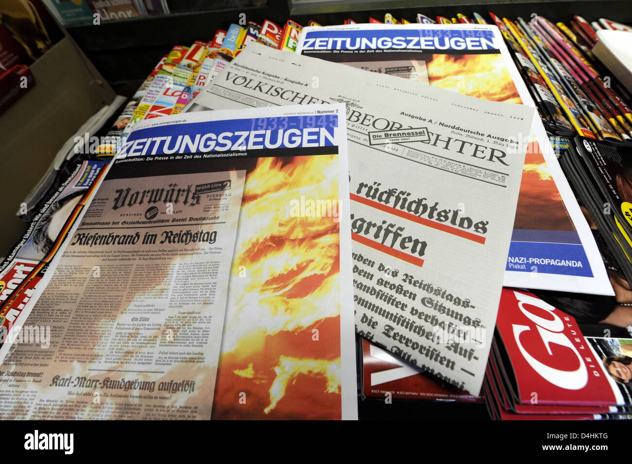 The illustration shows several newspapers in Munich, Germany, 22 ...