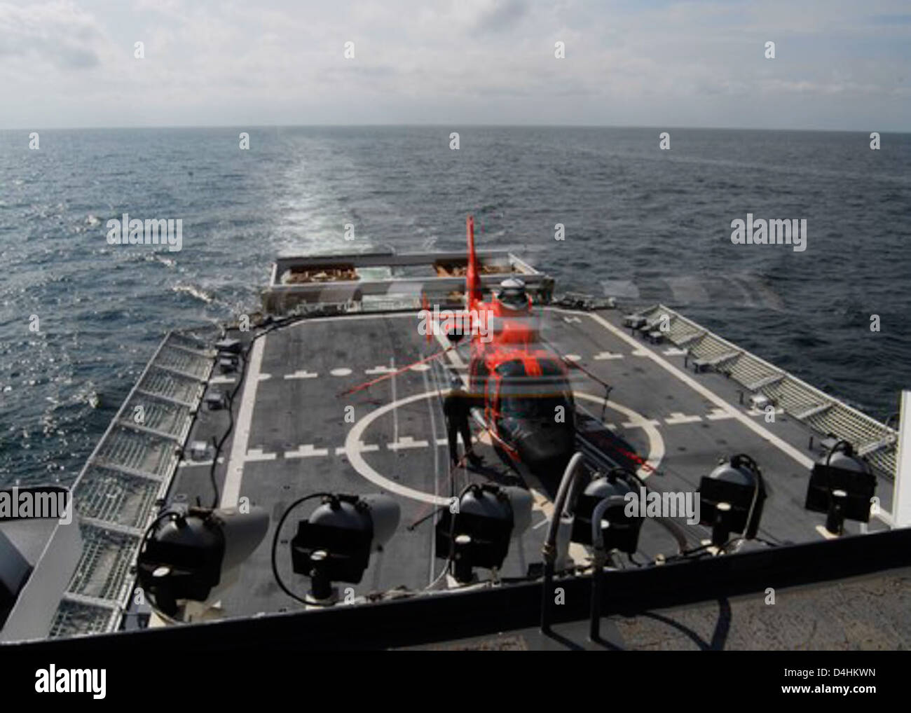 This image captures a Coast Guard boat involved in homeland security ...