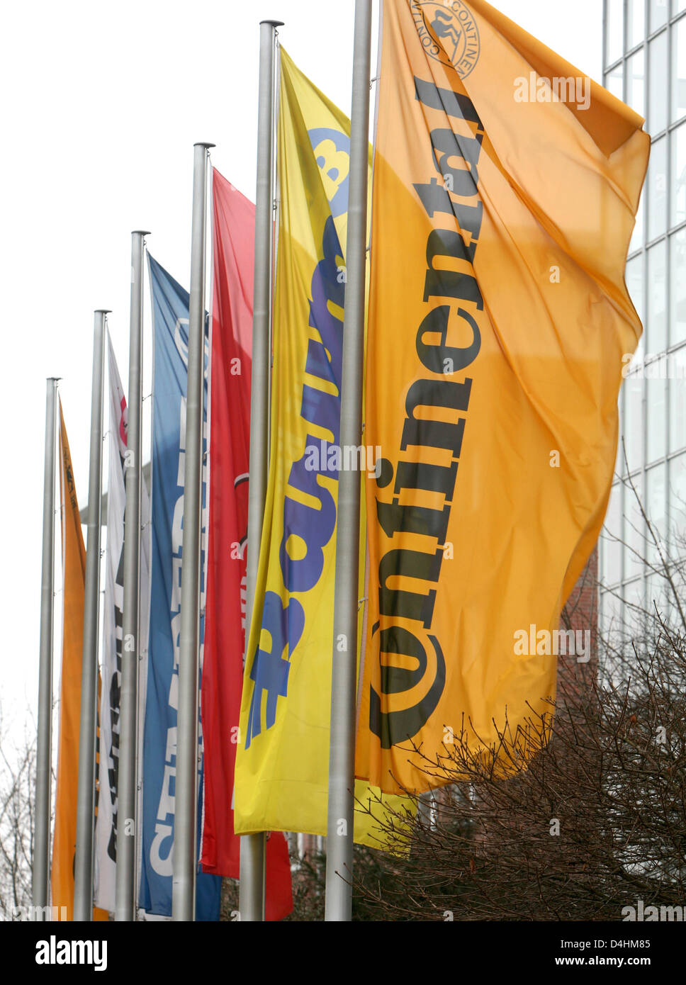 Flags sway in the wind outside the Continental headquarters in Hanover ...