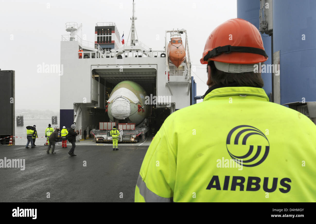 A cockpit segment of an Airbus A380 is unloaded off the new A380 ...