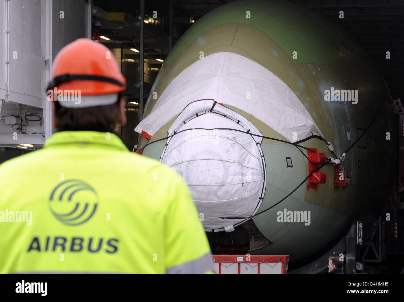 A cockpit segment of an Airbus A380 is unloaded off the new A380 ...