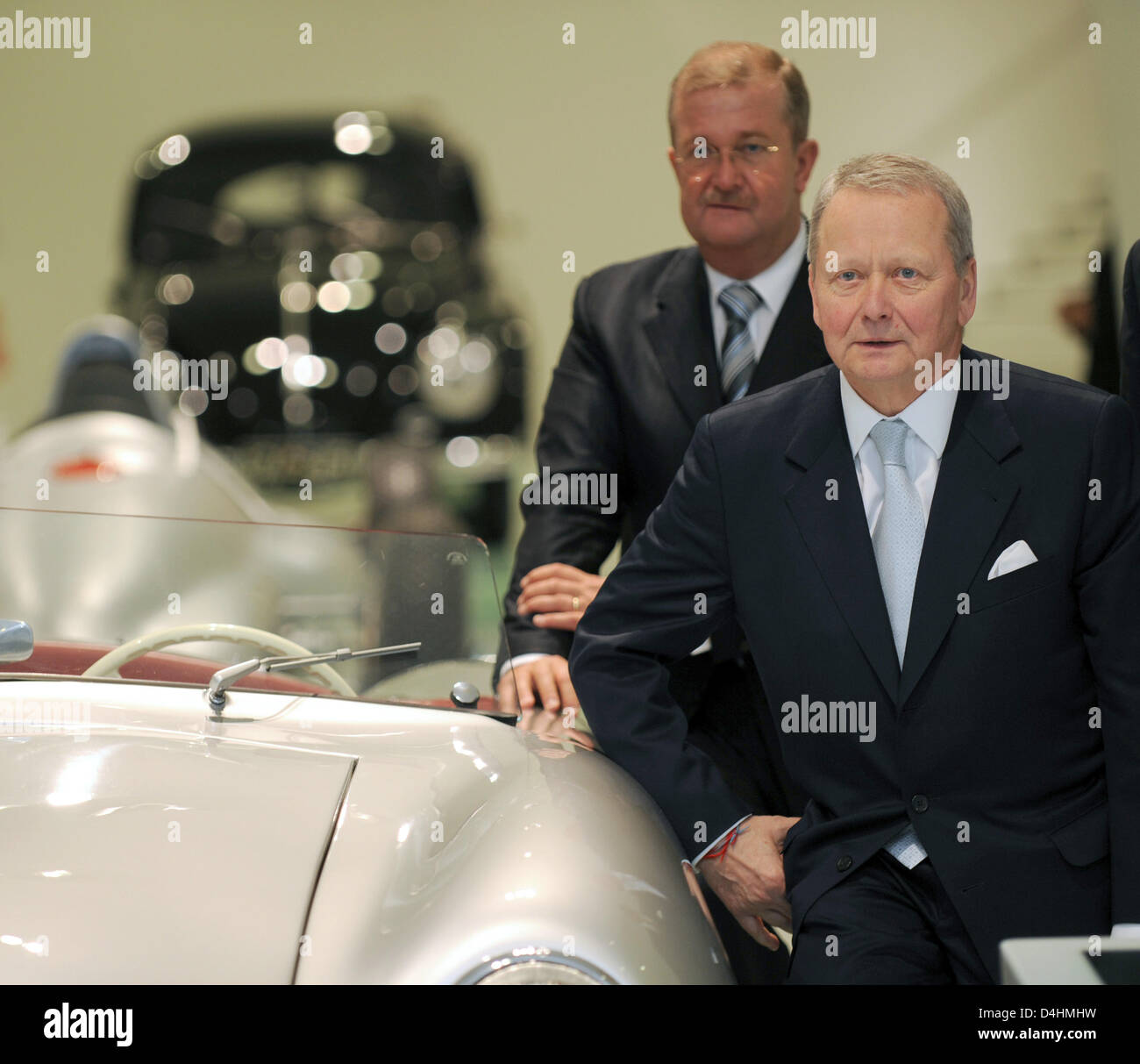 Wolfgang Porsche (R), chairman of the Porsche supervisory board, and ...
