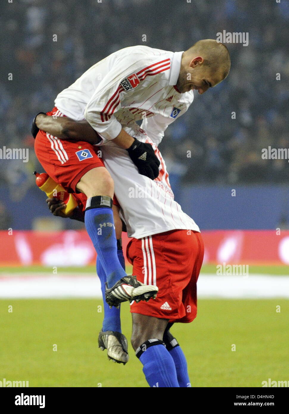 Hamburg?s Mladen Petric (top) cheers about his 1-0 score with teammate ...