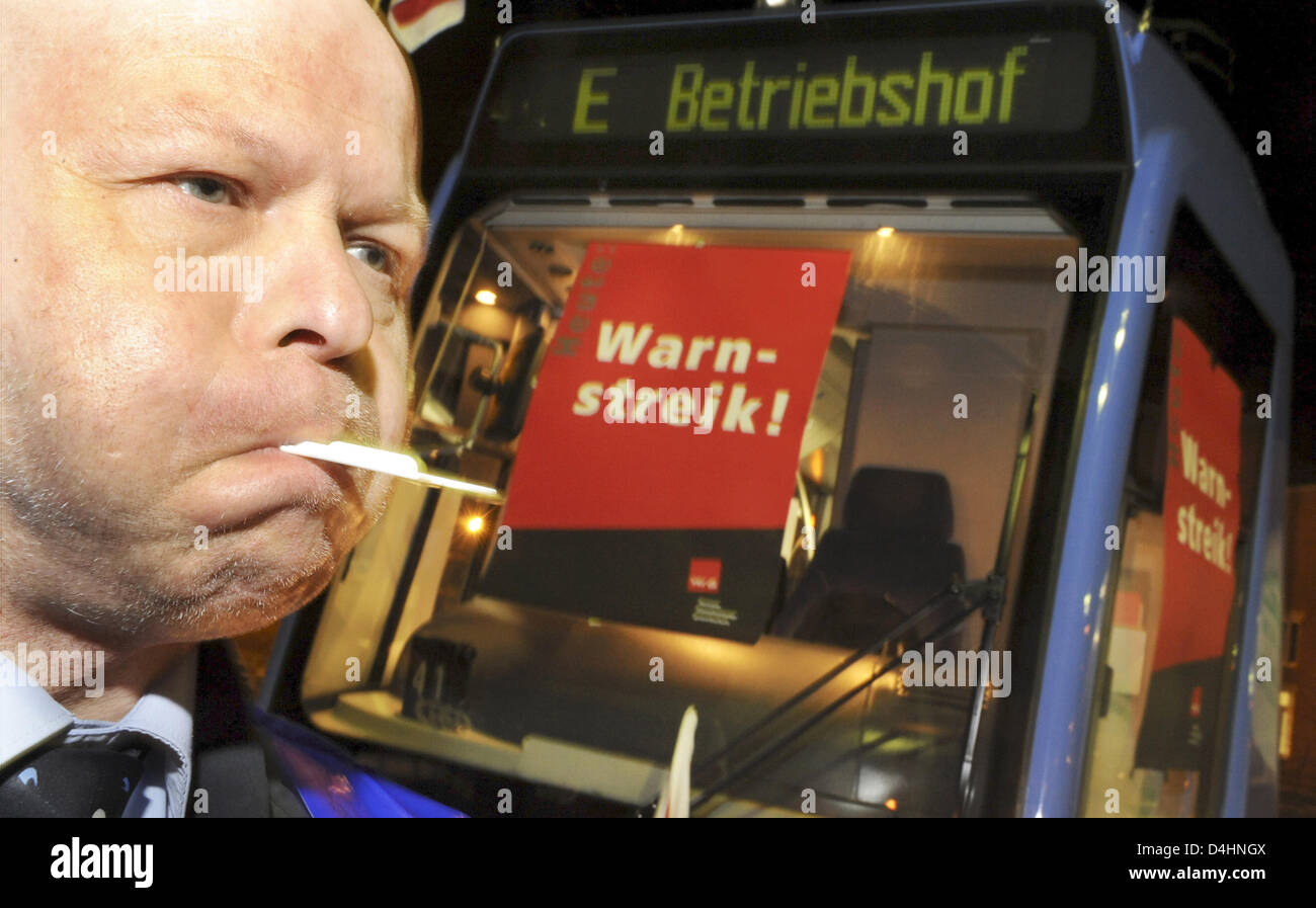 An employee of Munich?s public transport MVG blows a whistle during ...