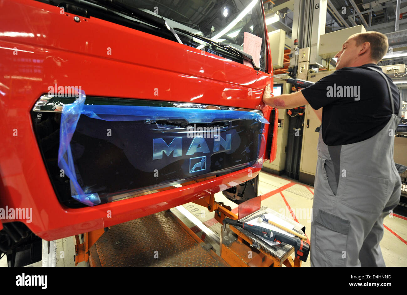 Employees of German engineering company MAN AG are pictured during the ...