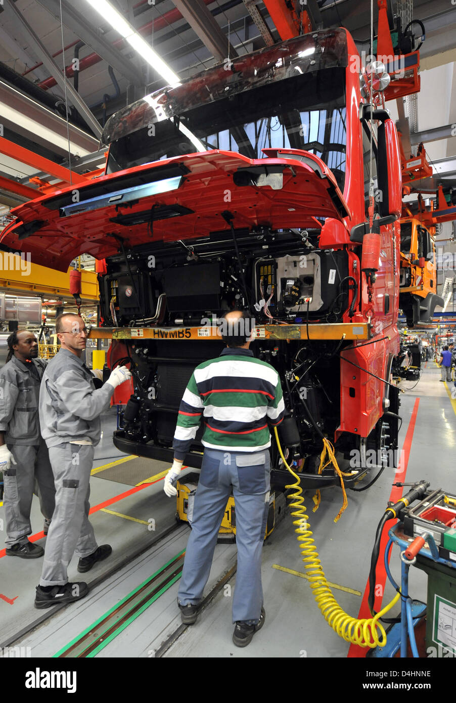 Employees of German engineering company MAN AG are pictured during the ...