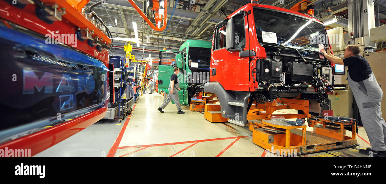 Employees of German engineering company MAN AG are pictured during the ...