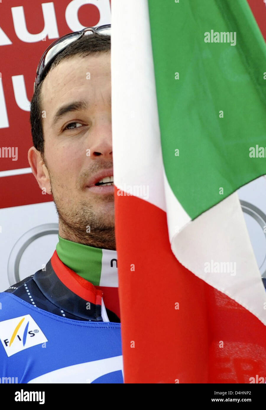 Italian Giorgio Rocca is pictured with Italy?s national flag during the ...