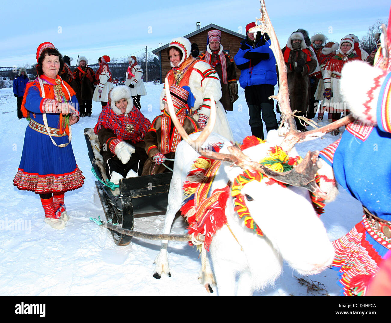 Norwegian Crown Princess Mette-Marit rides on a reindeer sleigh at a ...