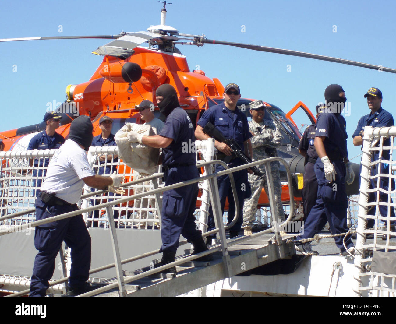The Coast Guard offloads security and military equipment as part of its ...