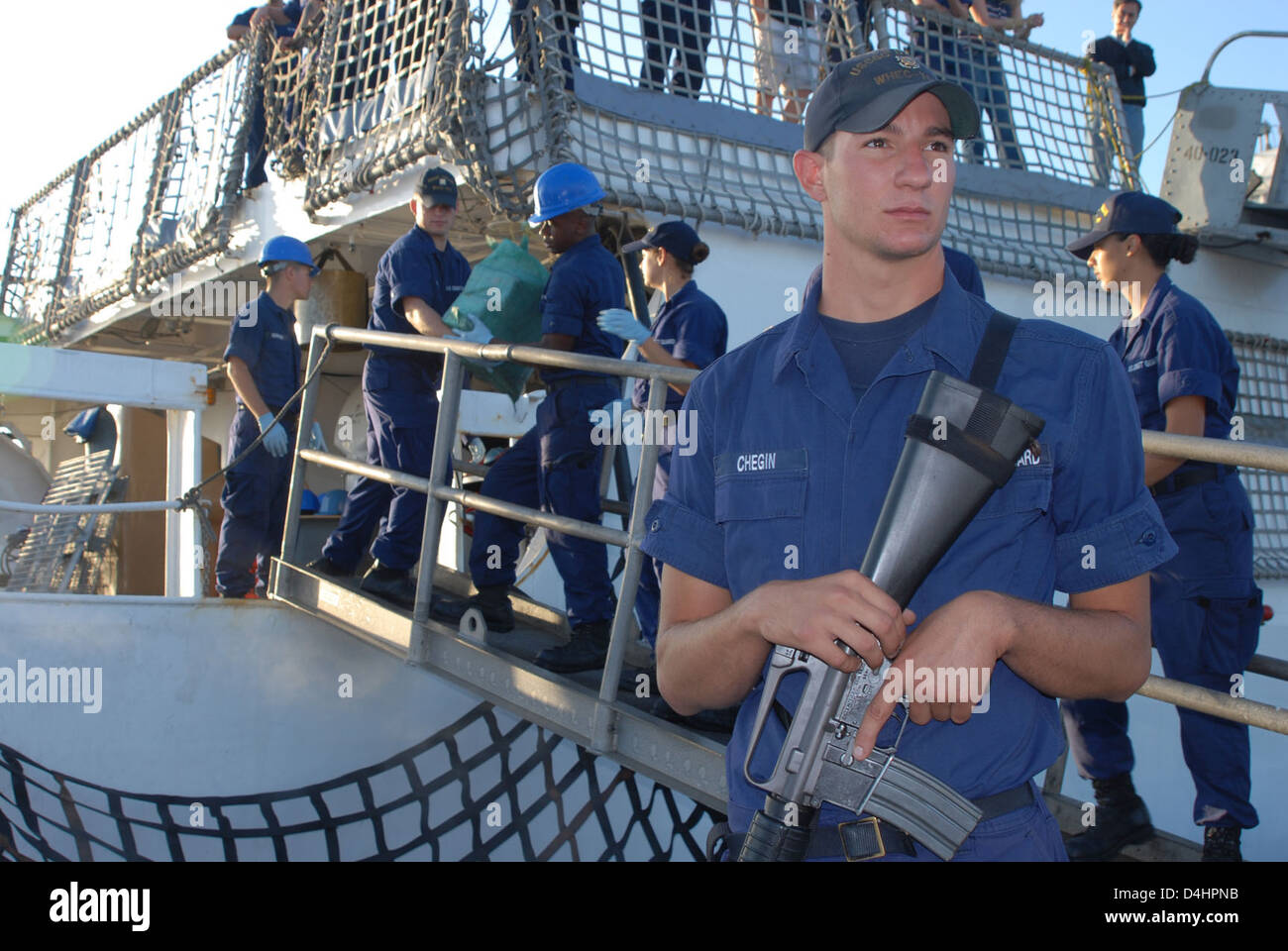 Seaman Thomas Chegin of the Coast Guard Cutter Dallas secures 9,000 ...