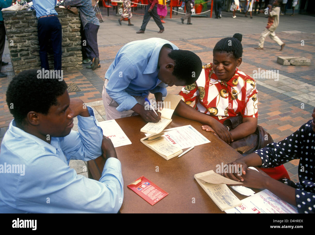 Buying raffle tickets hi-res stock photography and images - Alamy