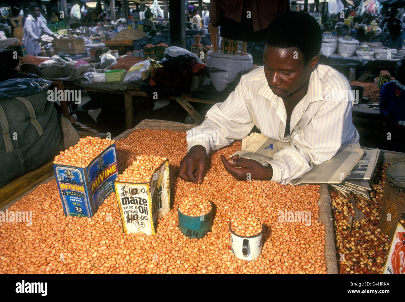 1, one, Zimbabwean man, vendor, grains for sale, central market, city ...