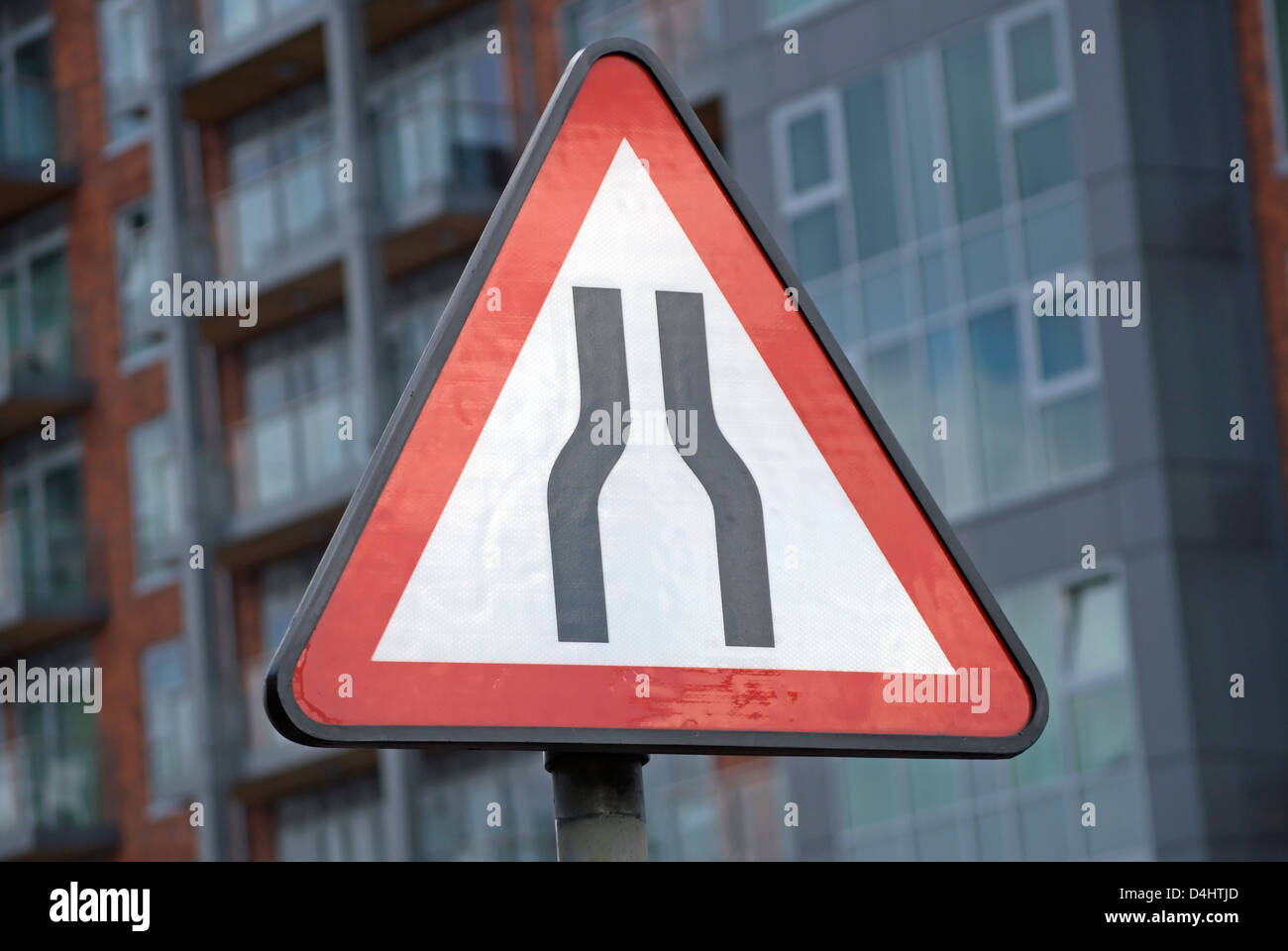 british road sign indicating road narrows, southern approach to ...