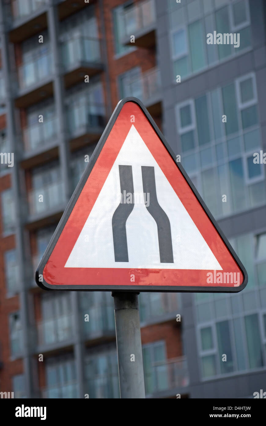 british road sign indicating road narrows, southern approach to ...