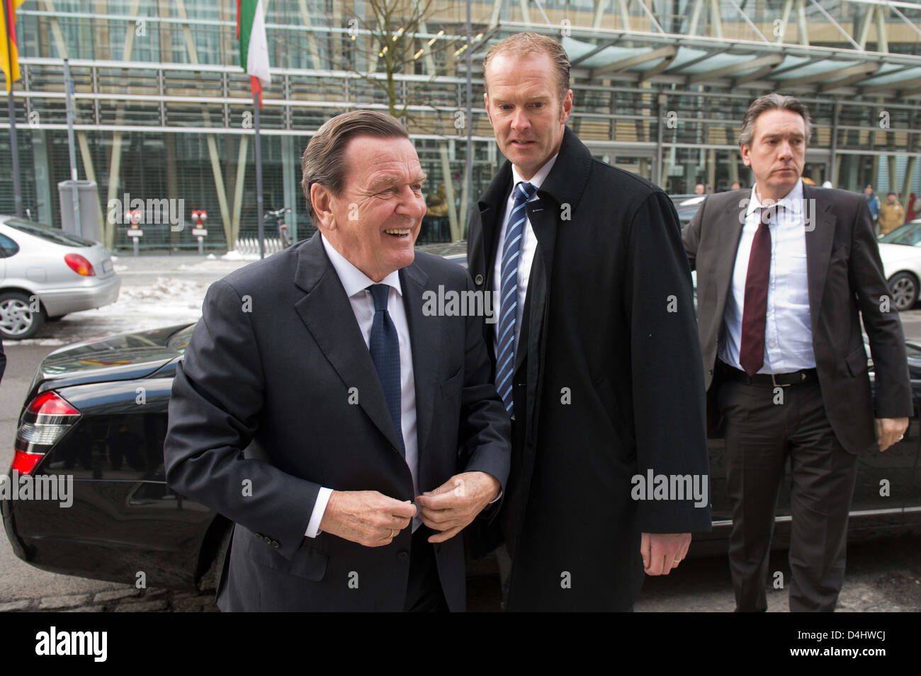 Former German Chancellor Gerhard Schroeder (L) arrives for the ...