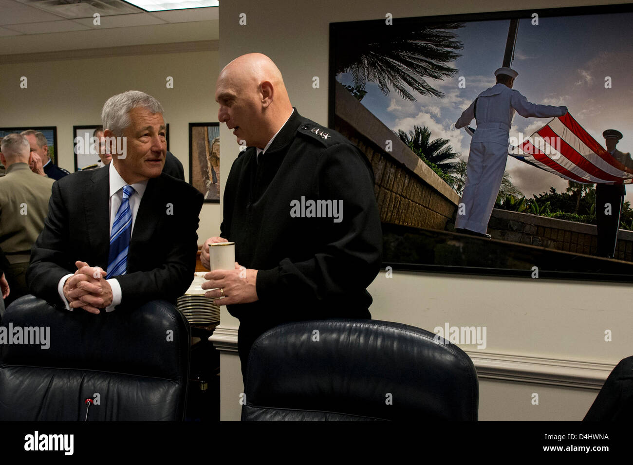 US Secretary of Defense Chuck Hagel speaks with Army General Ray ...