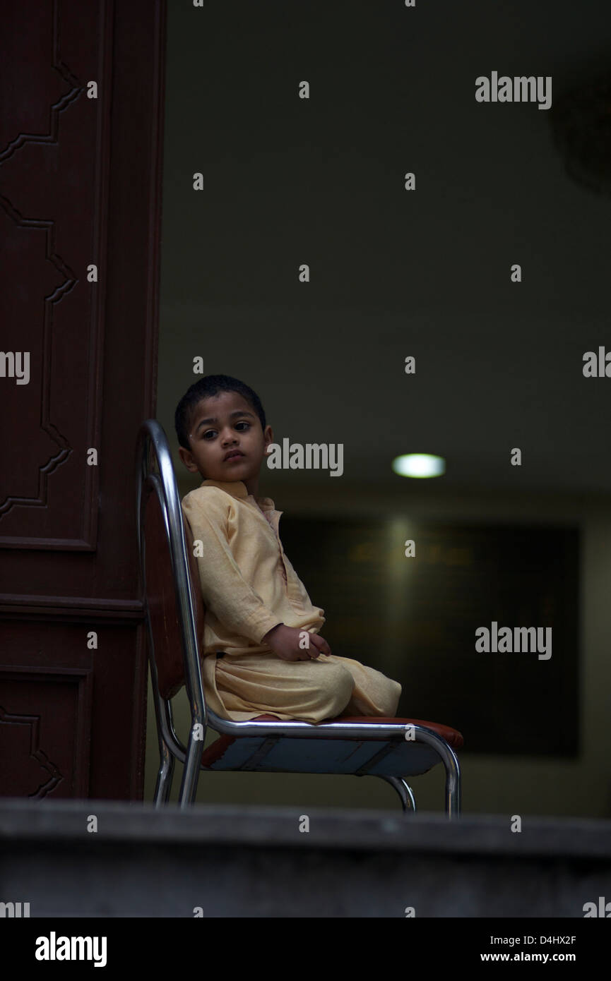 indian boy in a temple in Kowloon Stock Photo - Alamy