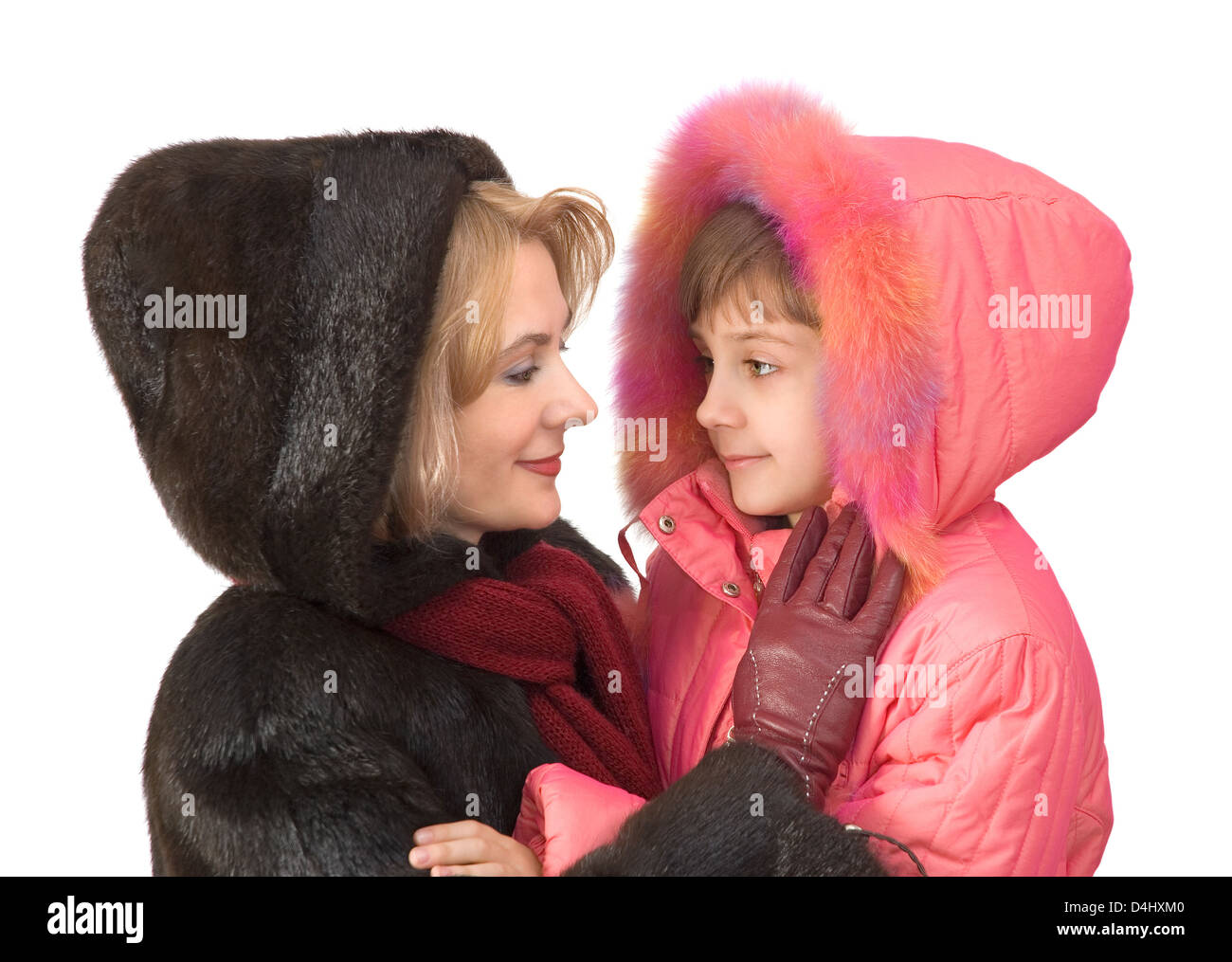 The daughter with mum in winter clothes Stock Photo - Alamy