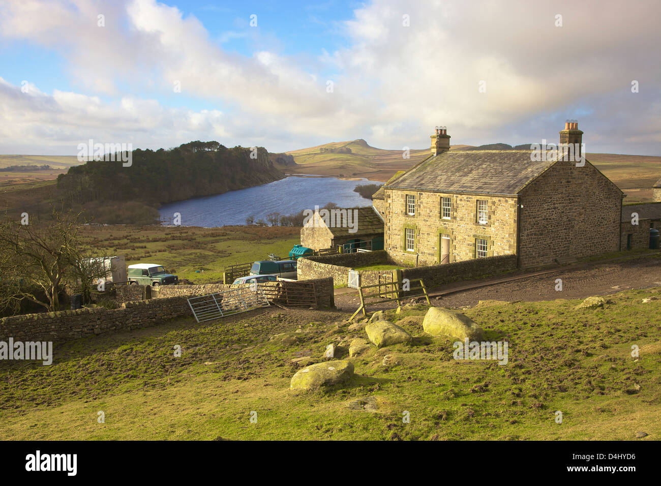 Hot Bank Farm with Highshield Crags above Crag Lough in the distance ...