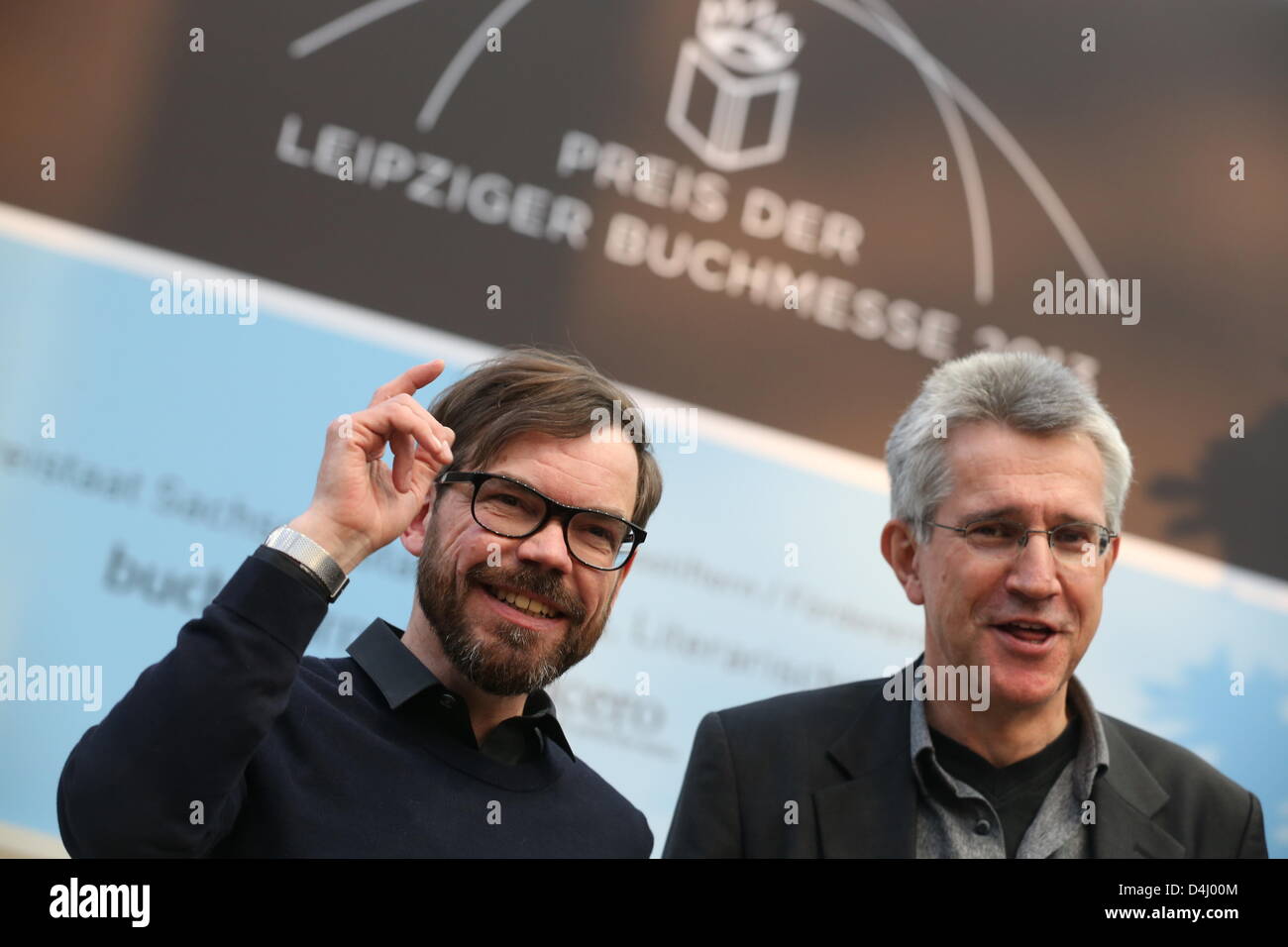German author David Wagner (L) stands after receiving the Leipzig Book ...