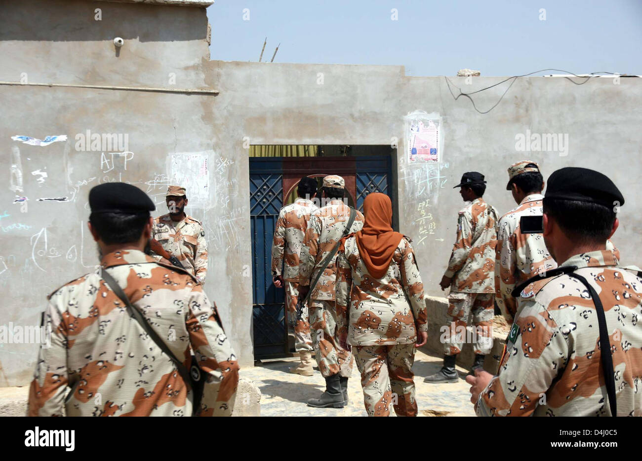 Rangers official are entering in a house during targeted search ...