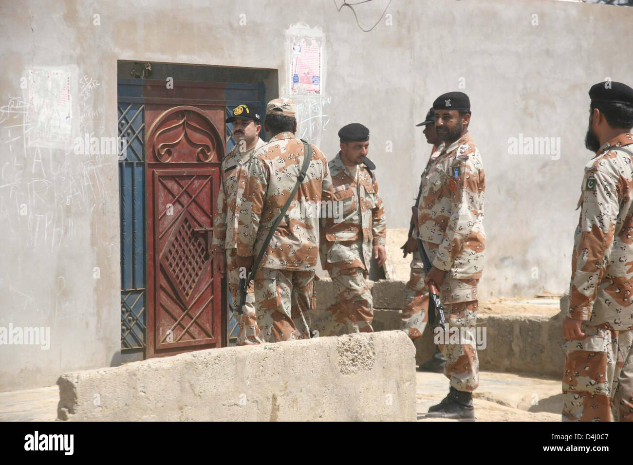 Rangers official cordon off a house during targeted search operation ...