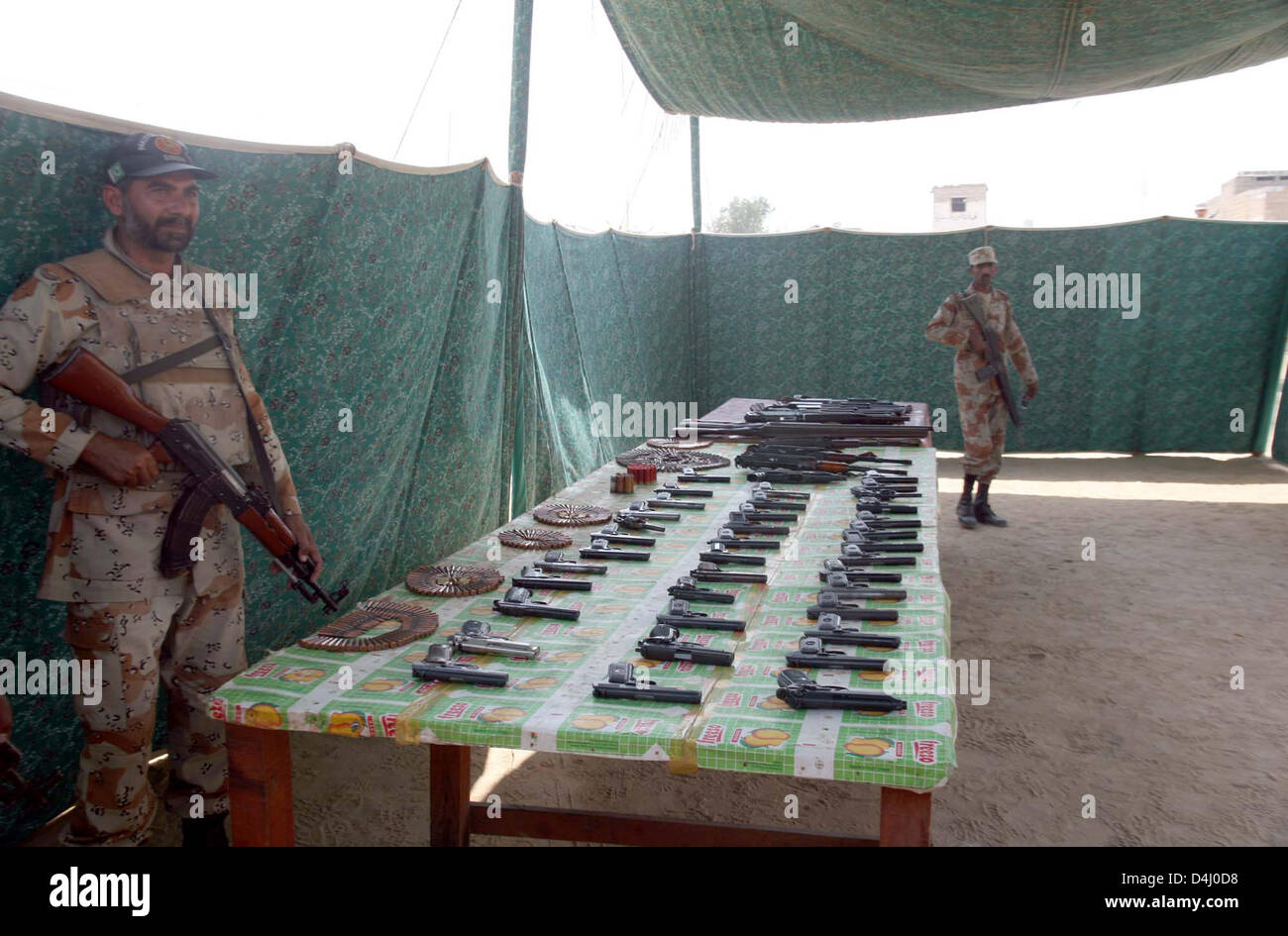 Rangers official are showing seized weapon that recovered from ...