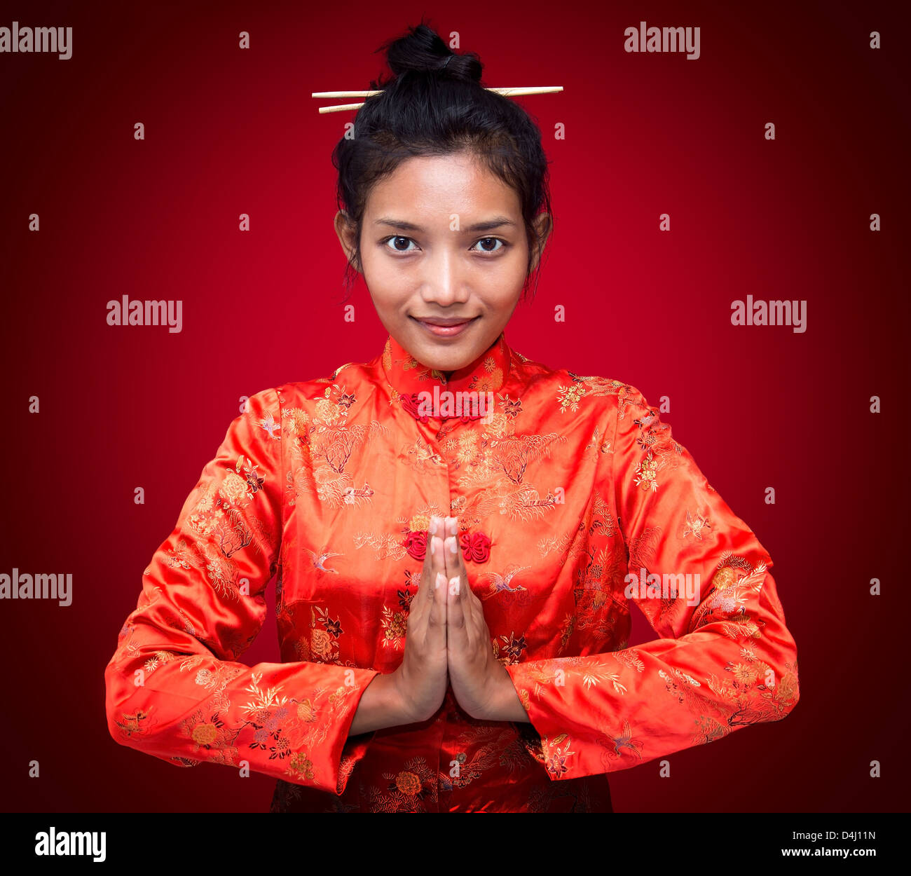 Asian woman greets Stock Photo - Alamy