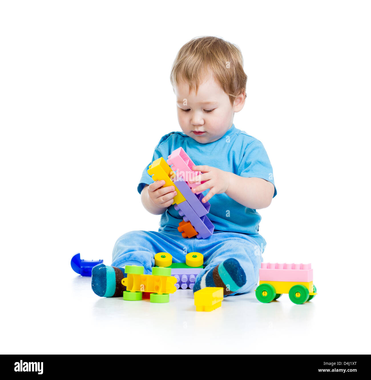 baby boy with construction set isolated on white background Stock Photo ...