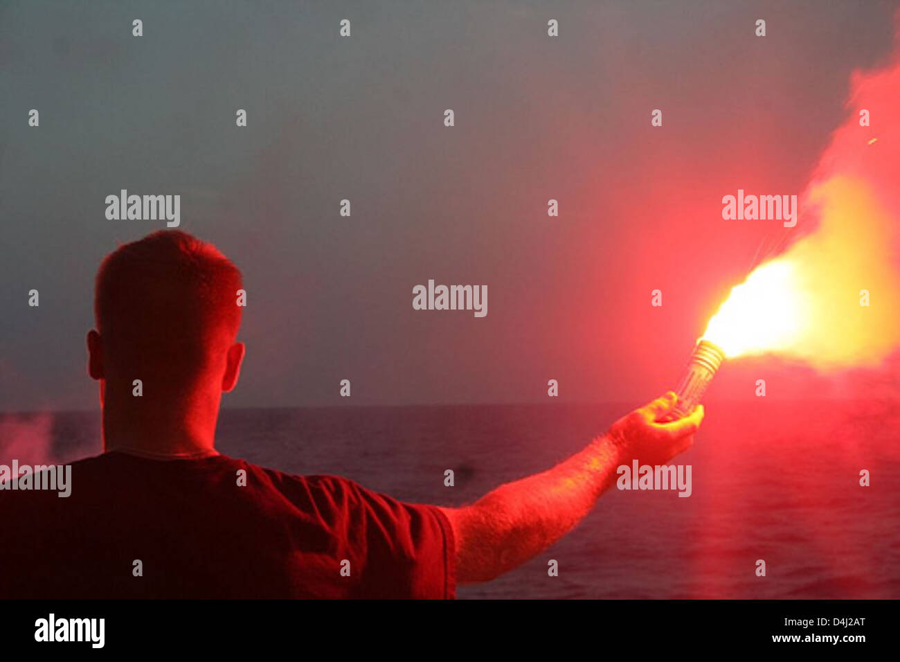 The Coast Guard Cutter Vigilant conducts flare training exercises as ...