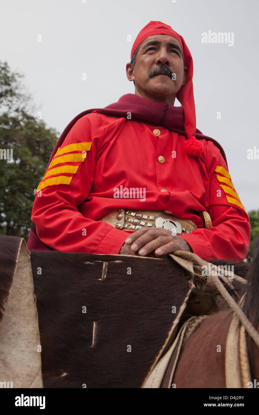 Parade of gauchos on horses in traditional costumes in Salta, Argentina ...
