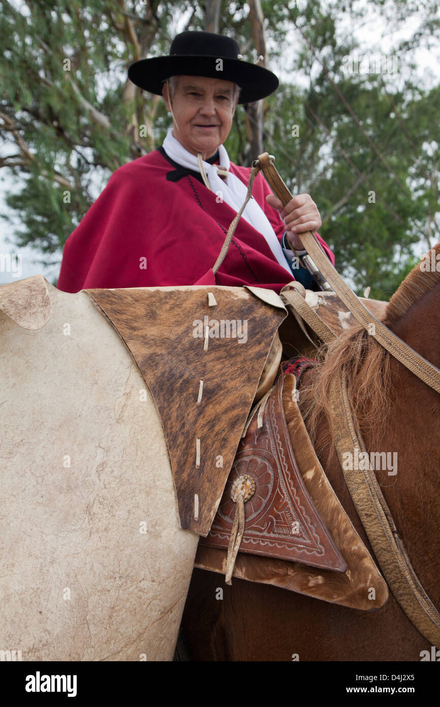 Parade of gauchos on horses in traditional costumes in Salta, Argentina ...