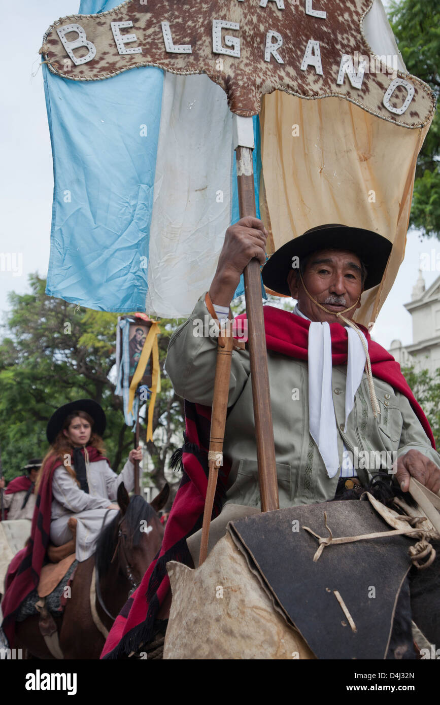 Parade of gauchos on horses in traditional costumes in Salta, Argentina ...