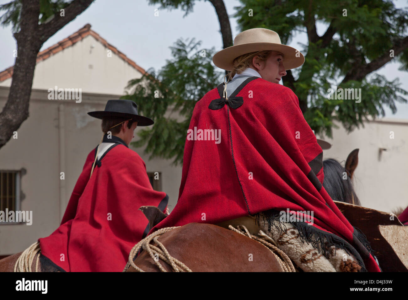 Parade of gauchos on horses in traditional costumes in Salta, Argentina ...