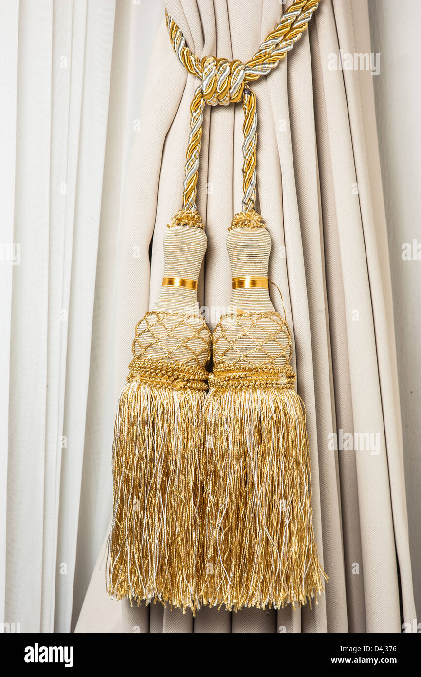 A pair of curtain holder Stock Photo - Alamy